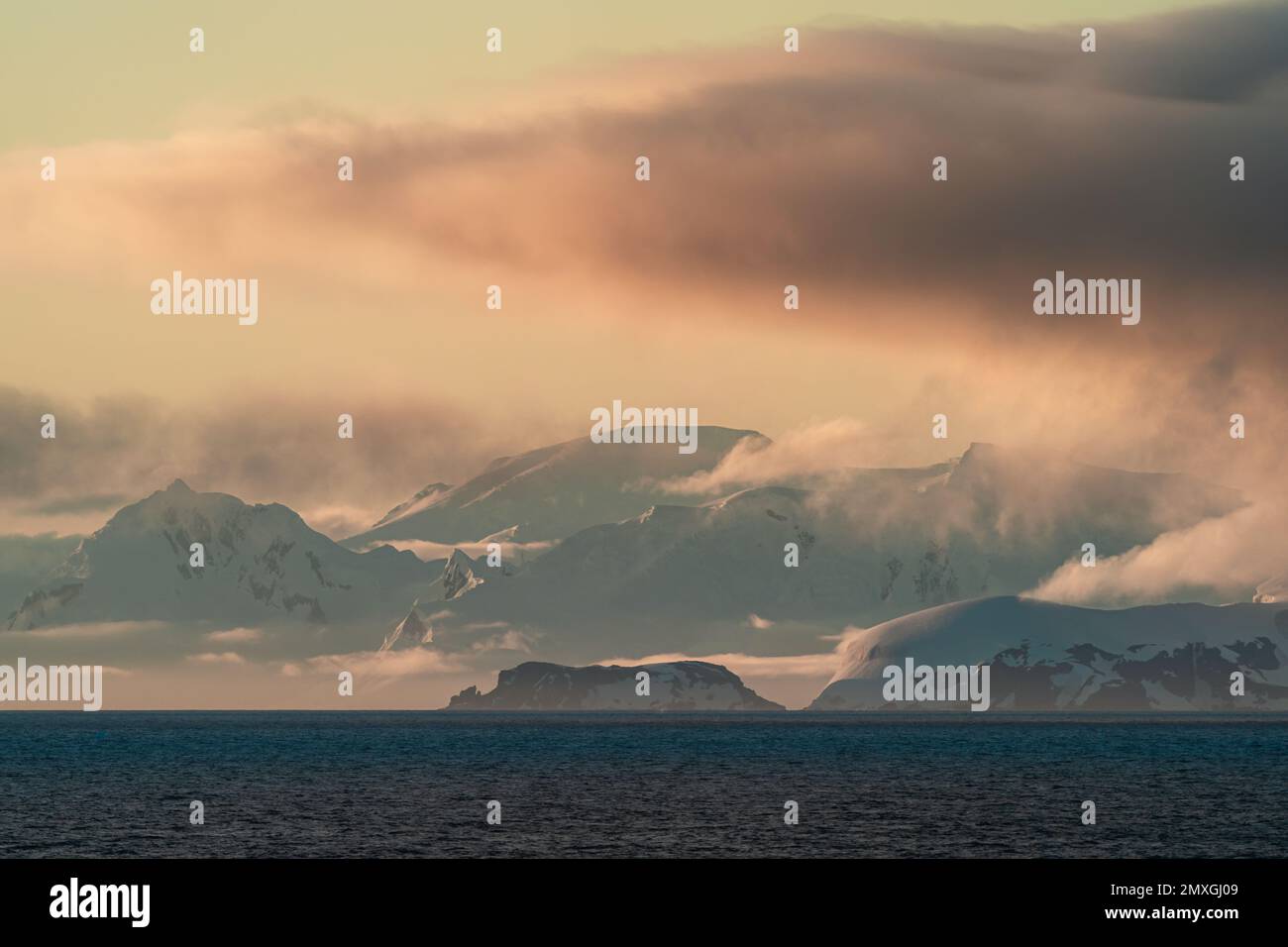 Looking out at the peaks and mountains of the Antarctic Peninsula ...