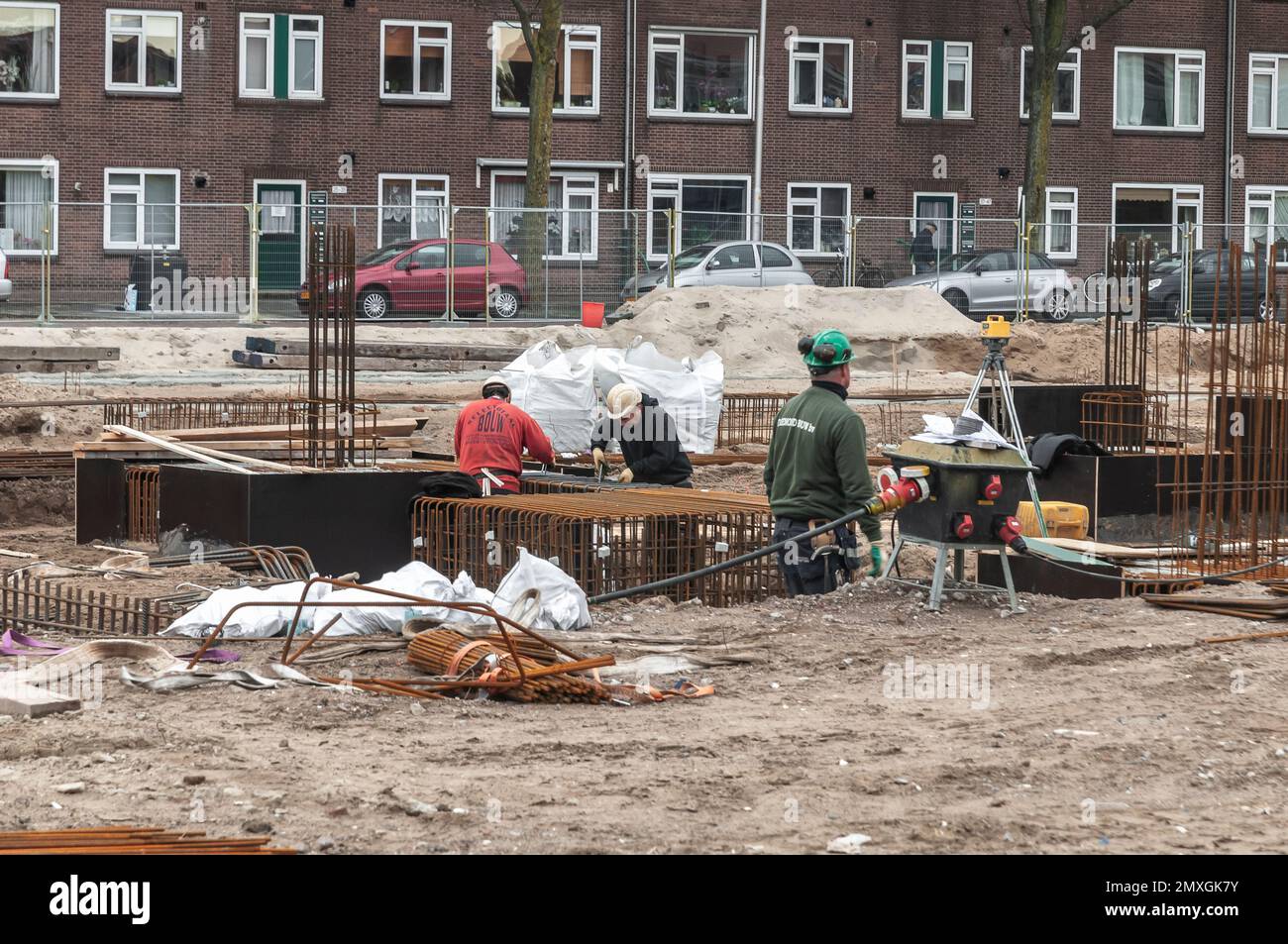 concrete workers at work on a construction site Stock Photo - Alamy
