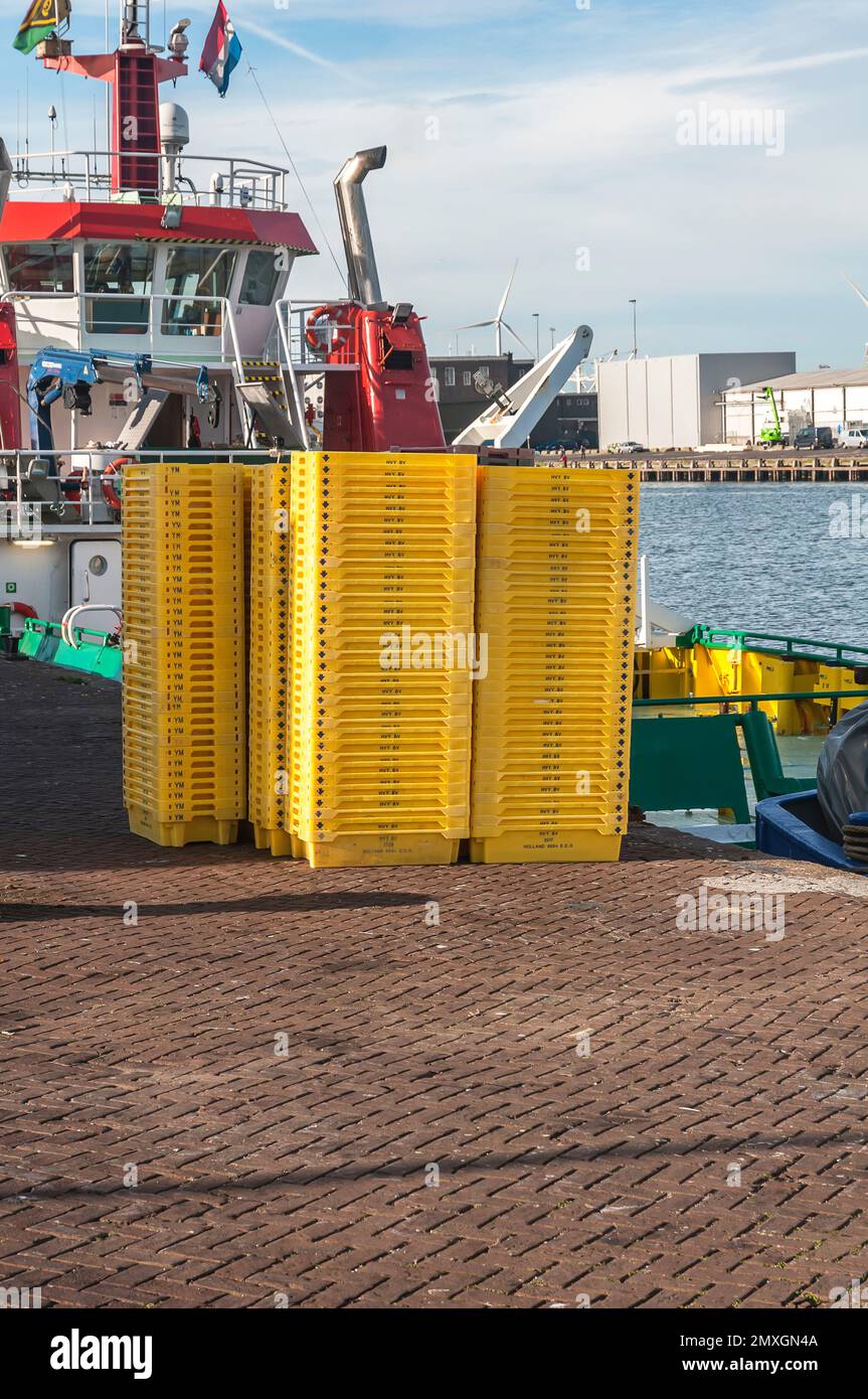 Yellow plastic crates hi-res stock photography and images - Alamy