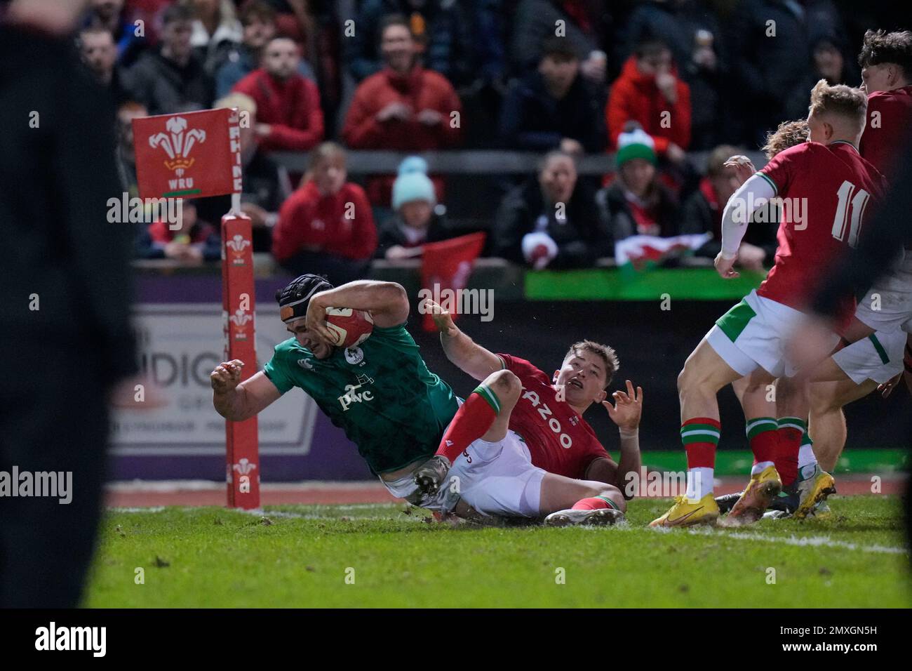 Conor O'Tighearnaigh #5 of Ireland U20's stretches over the line to ...