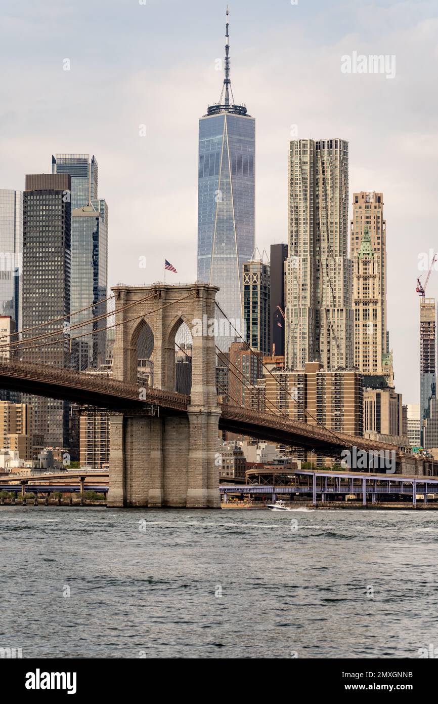 The Brooklyn Bridge with the One World Trade Center and skyscrapers in ...