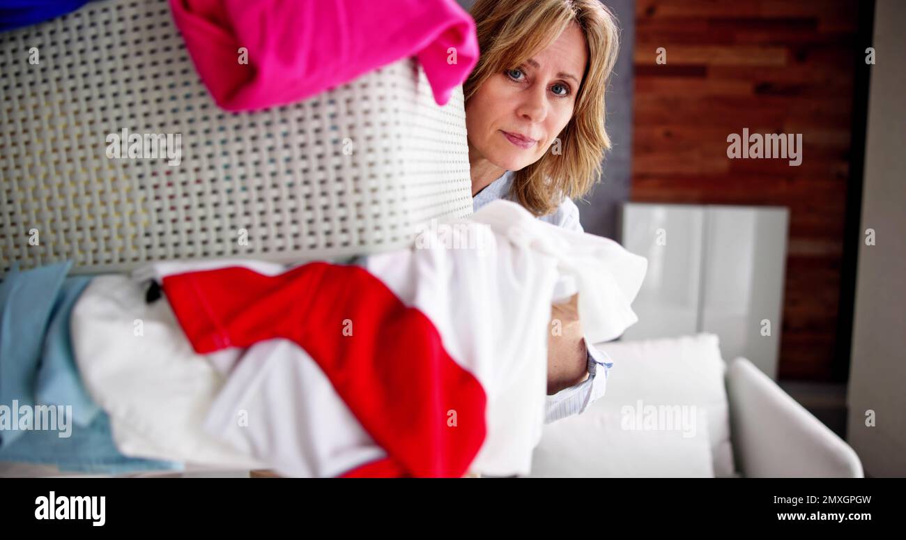 Declutter House Closet. Tidy Wardrobe Clothes. Female Cleaning Stock ...