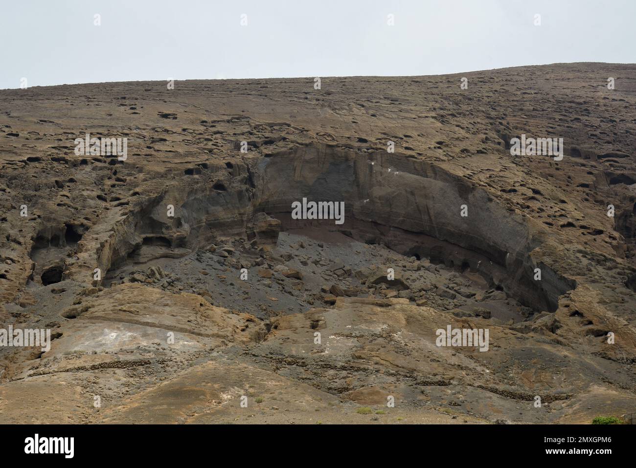 Traces of lava extraction on the slopes of a volcano in Lanzarote Stock ...
