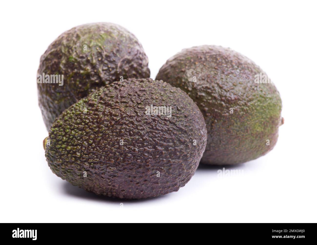 Group of whole avocado isolated on white background Stock Photo - Alamy