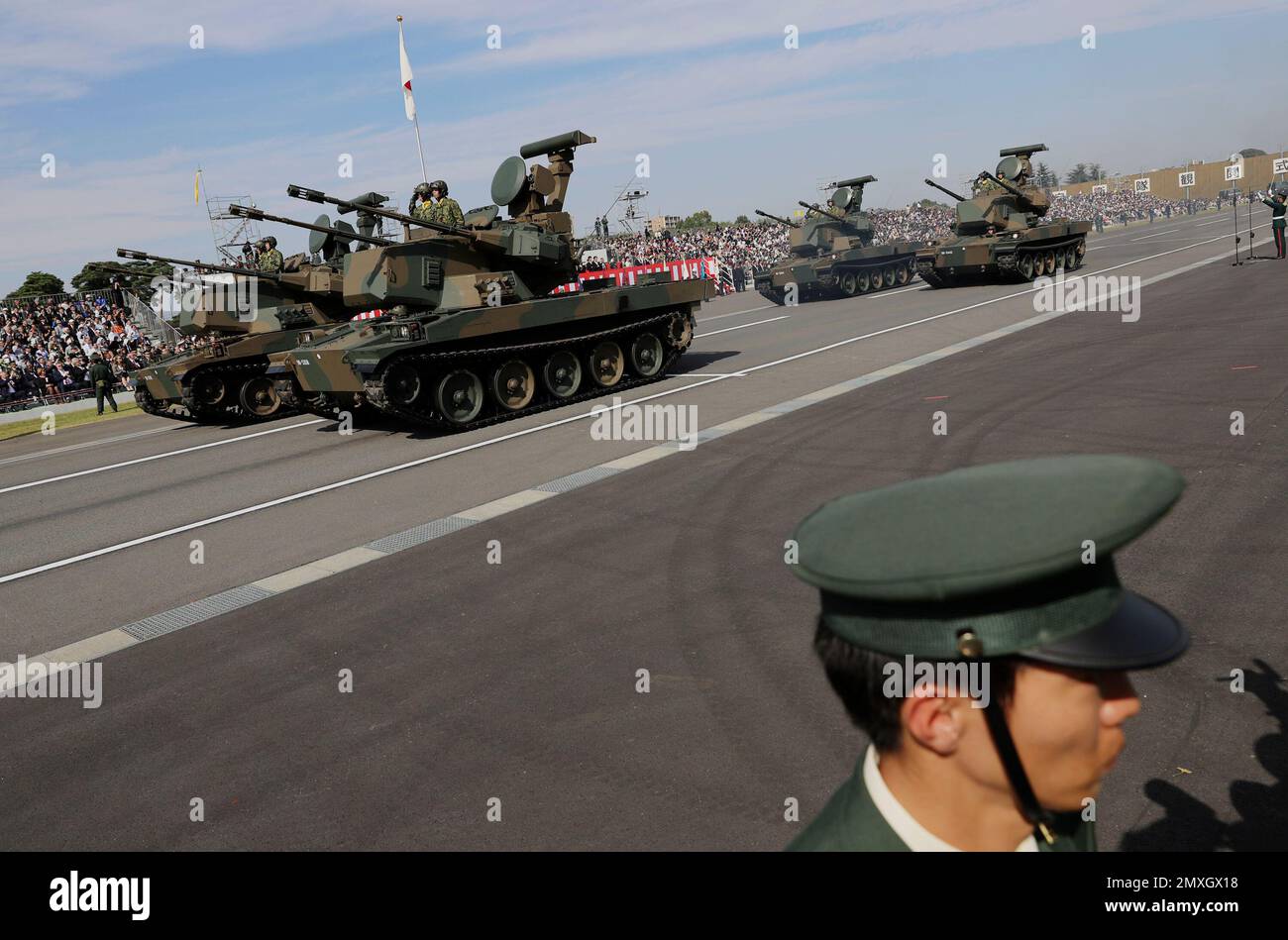 Japanese Ground Self-Defense Force's 87-type anti-aircraft tanks parade ...