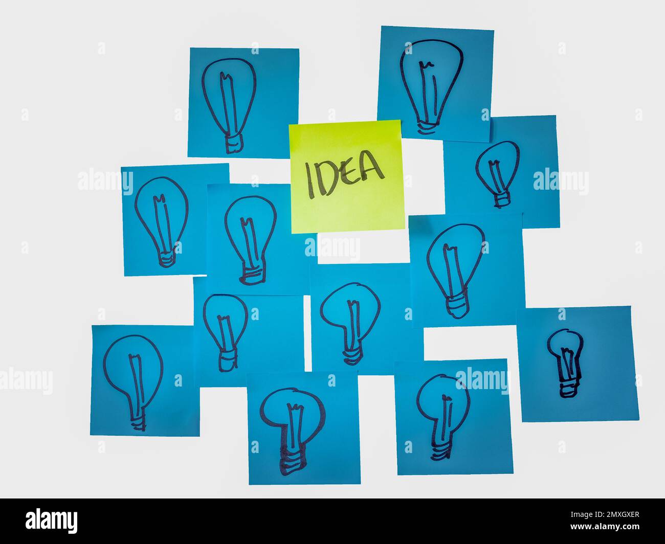 Concept of lighbulbs with an illuminated lightbulb to indicate ...