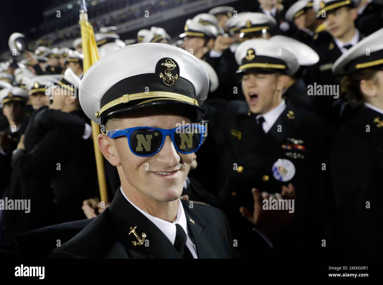 Members of the U.S. Naval Academy celebrate after an NCAA college ...