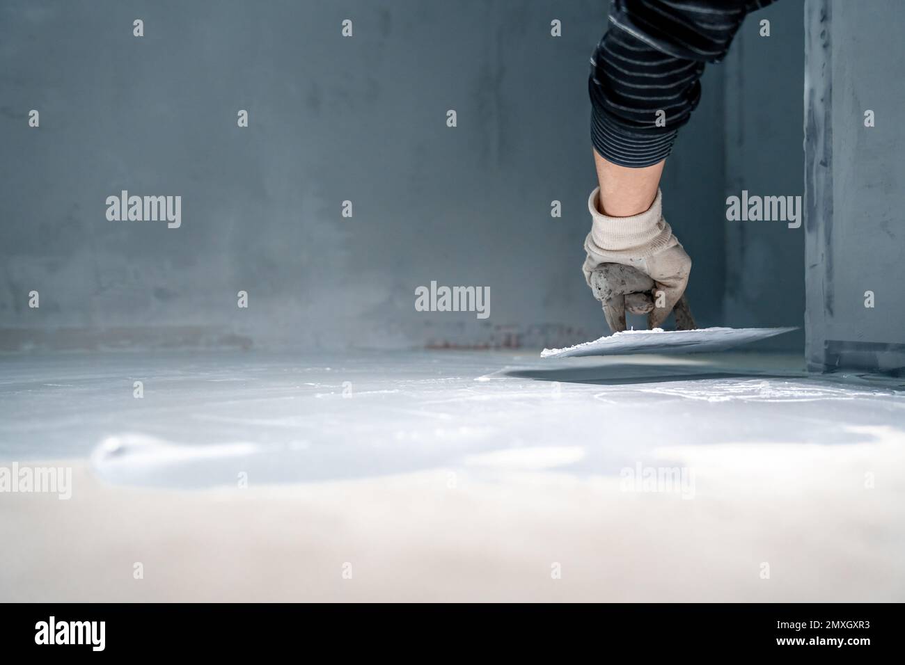 waterproofing of the bathroom floor in a new building Stock Photo - Alamy