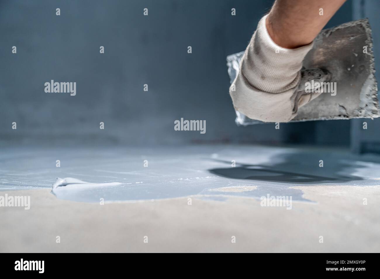 waterproofing of the bathroom floor in a new building Stock Photo - Alamy