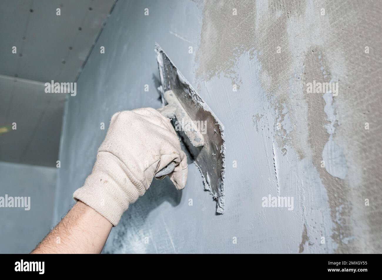 application of insulation to the wall against moisture and water Stock ...