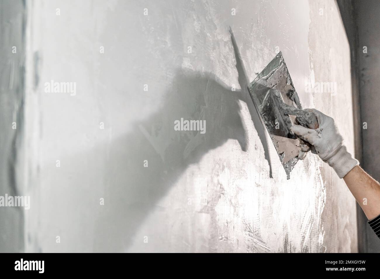 application of insulation to the wall against moisture and water Stock ...