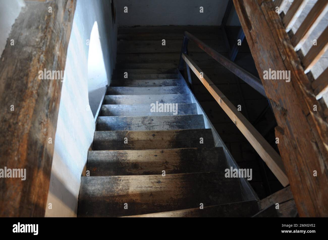 Old wooden stairs and inside a forgotten home.The staircase was ...