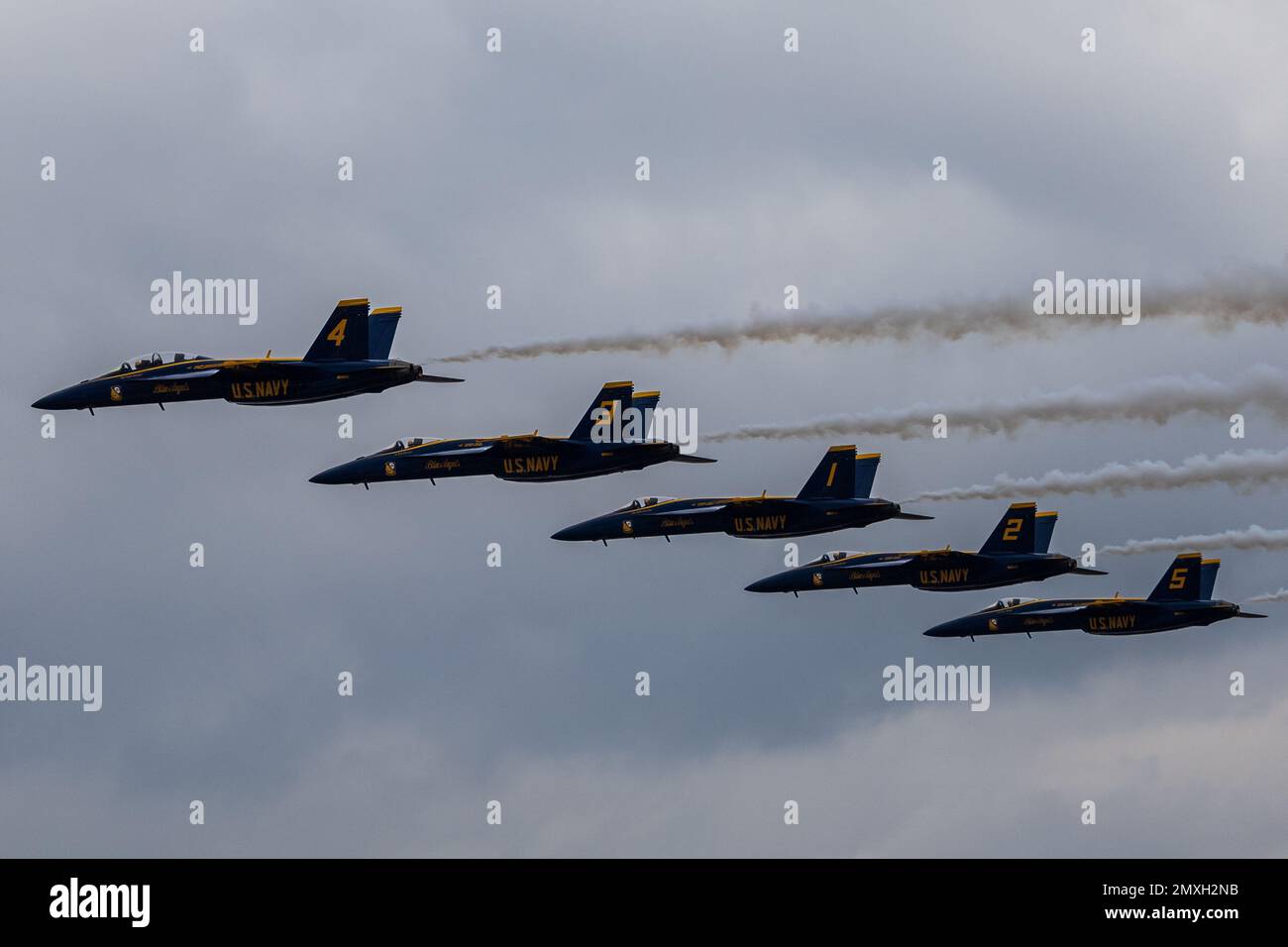 An aerial shot of the Blue Angels aircrafts performing in the air ...