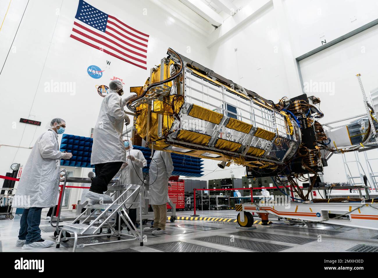 Engineers and technicians work on the scientific core of the NASA-ISRO ...