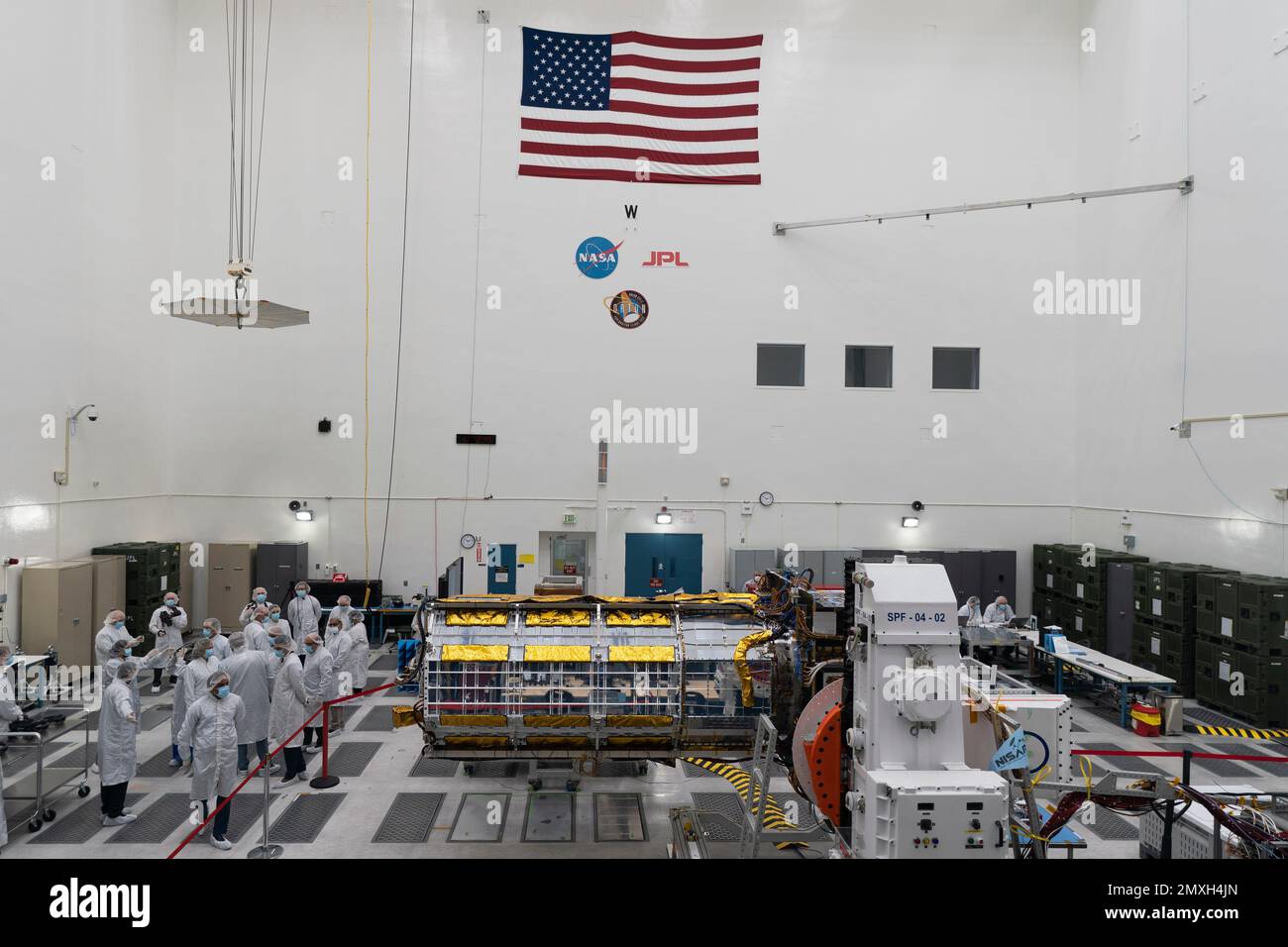 Officials and delegates gather next to the scientific core of the NASA ...