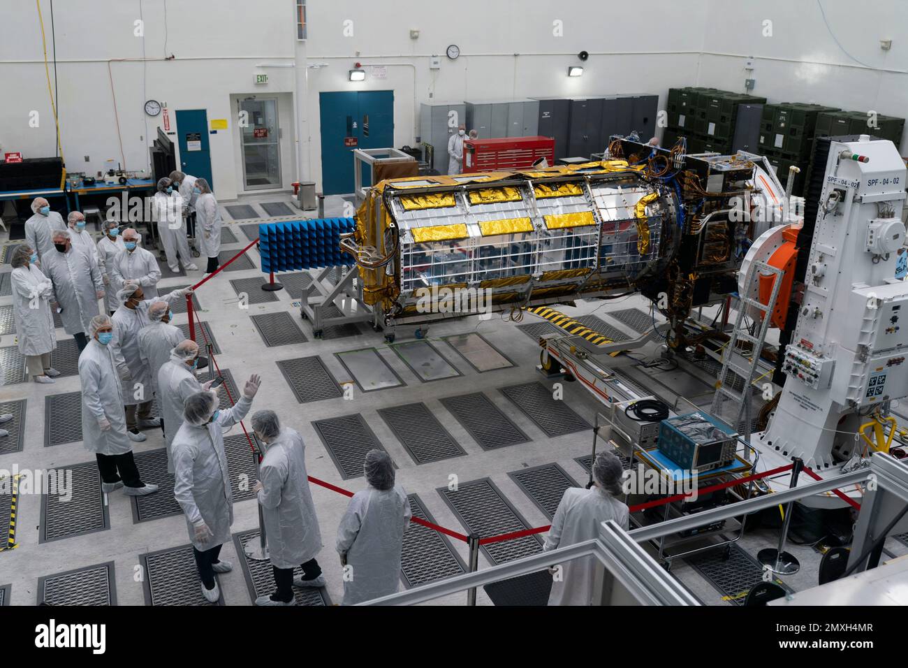 Officials and delegates look at the scientific core of the NASA-ISRO ...