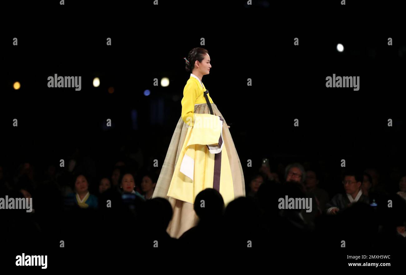 A model wears the traditional South Korean "Hanbok" dress during a ...