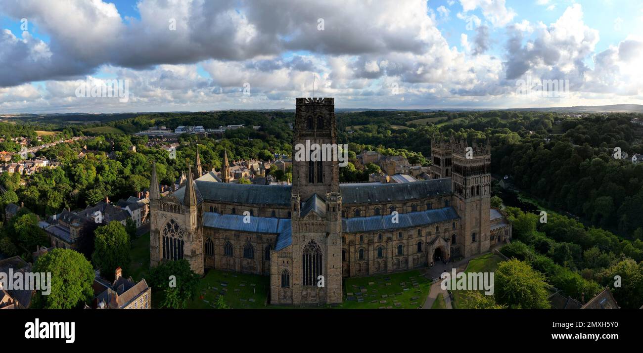 An aerial panoramic view of Durham Cathedral surrounded by lush green ...