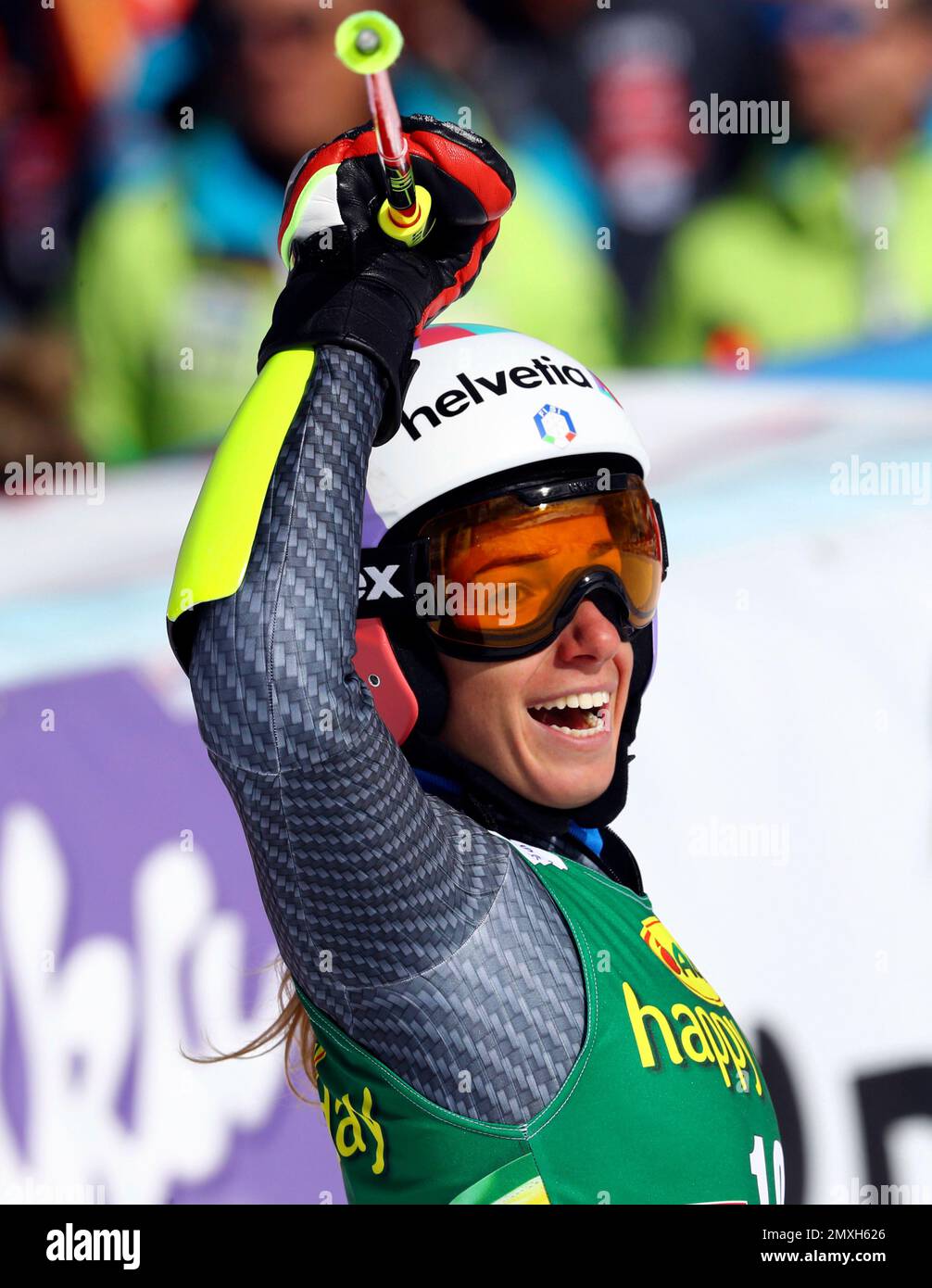 Italy's Marta Bassino celebrates her third place in the finish area ...