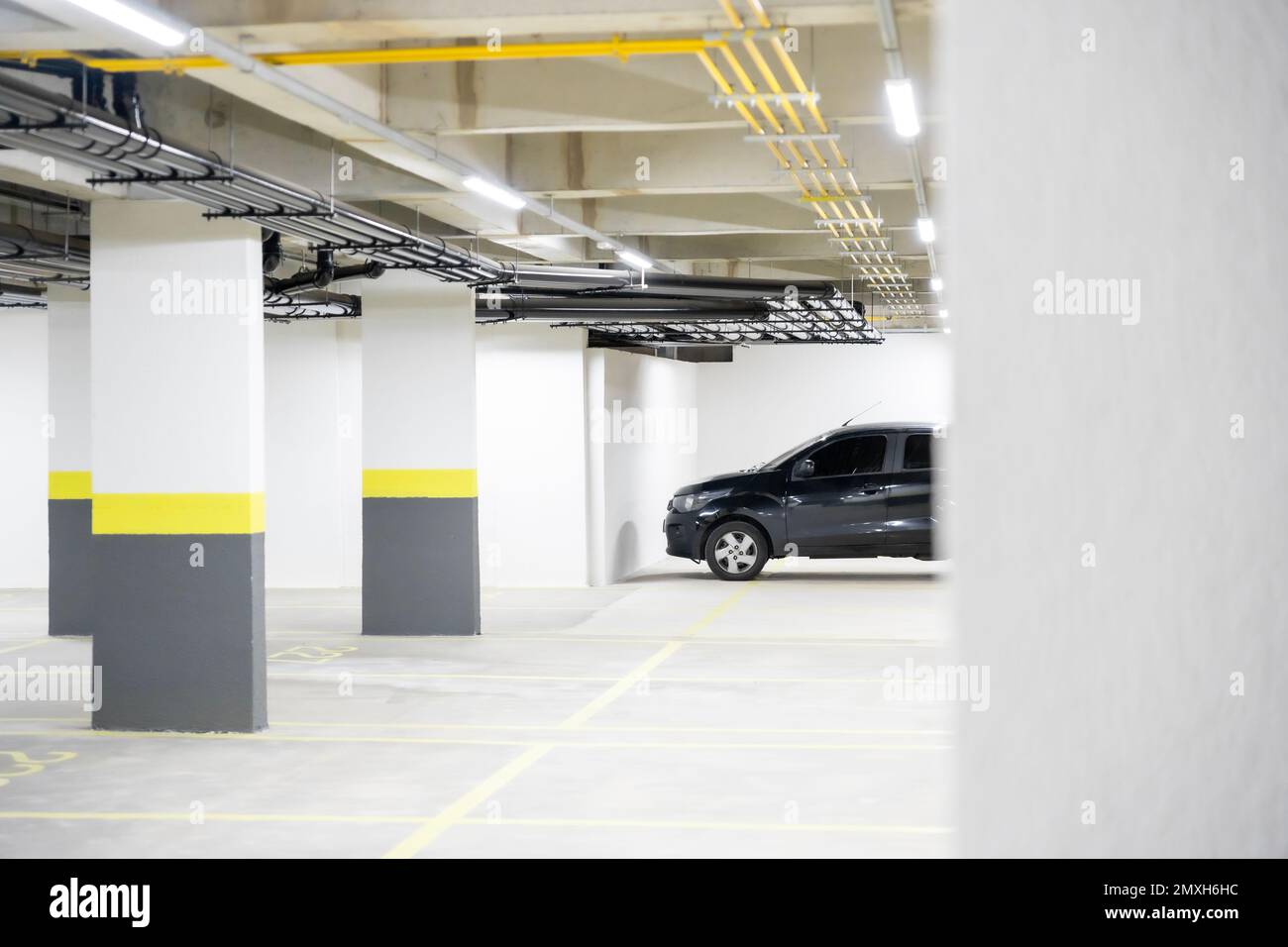 A single black car parked at the new spacious parking lot in Sao Paulo ...