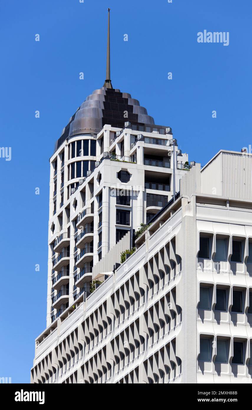 The view of concrete modern buildings and a tower in Auckland downtown ...