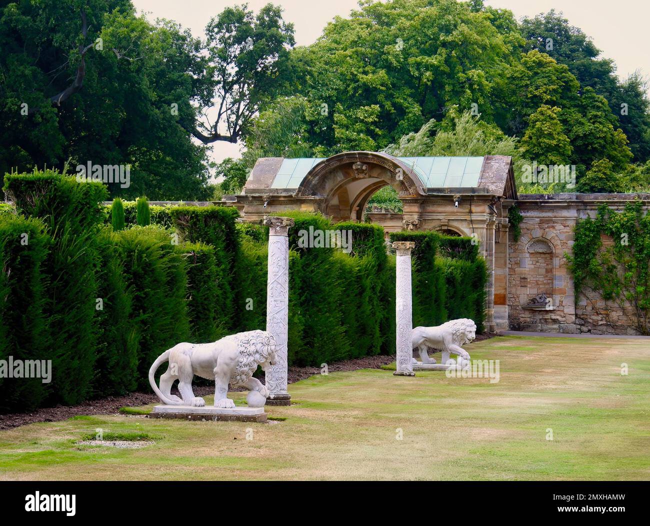 White lions and columns in ornamental gardens Hever Castle Hever Kent ...