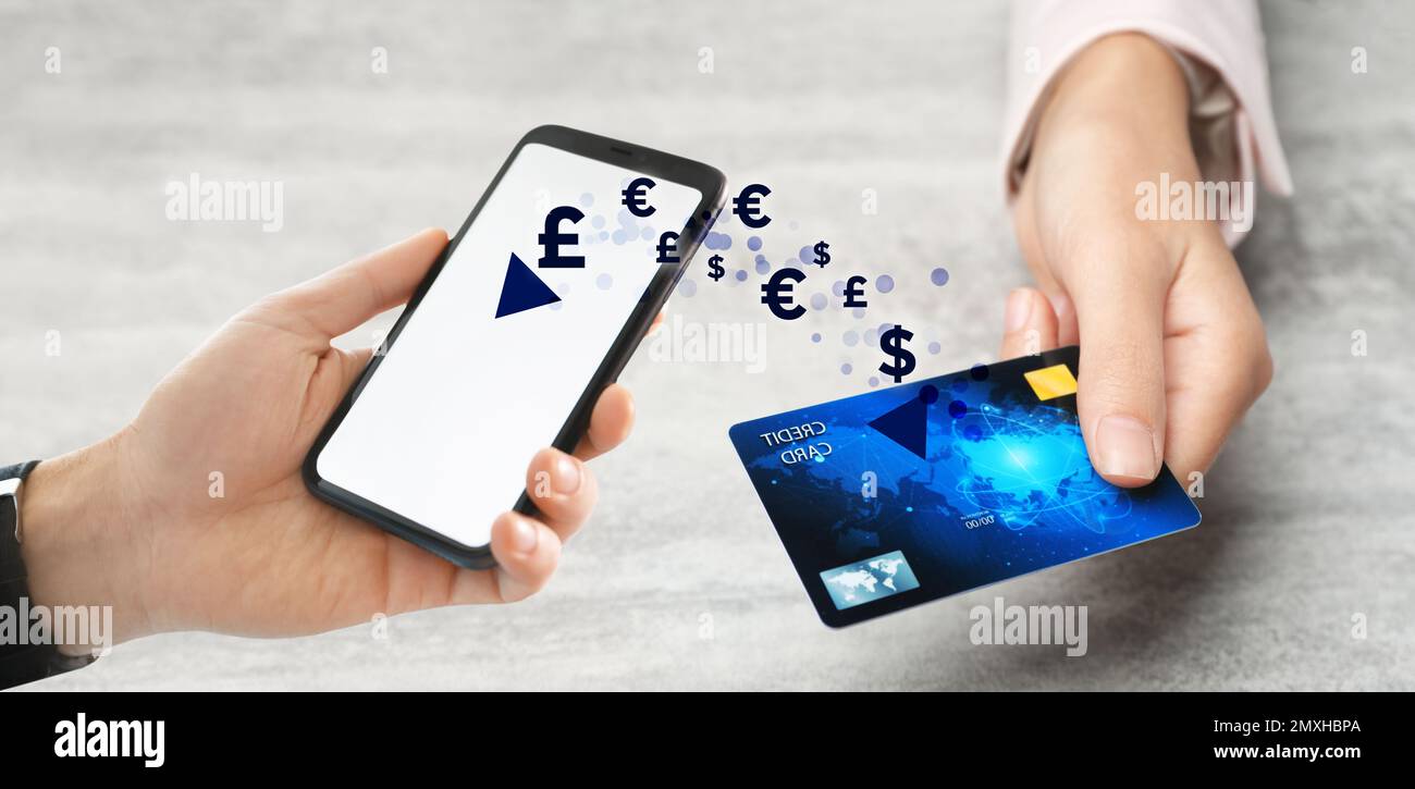 Fintech concept. Man using phone to make financial transactions with ...