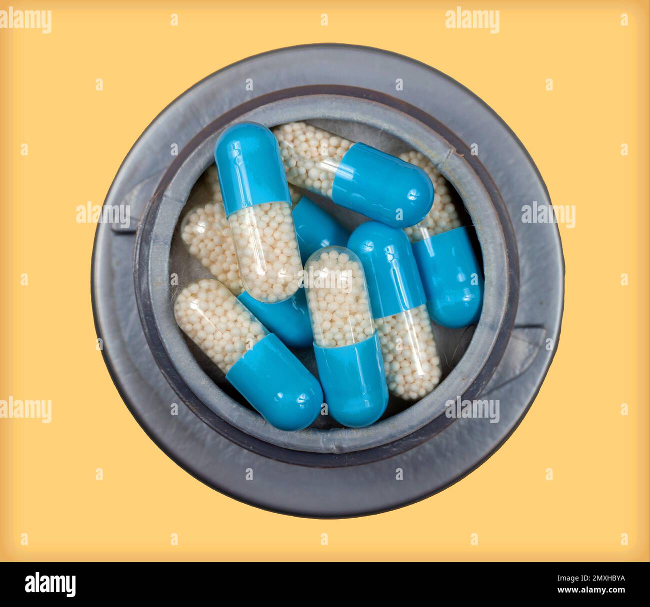 Pile of blue prescription drugs pills in open container Stock Photo - Alamy