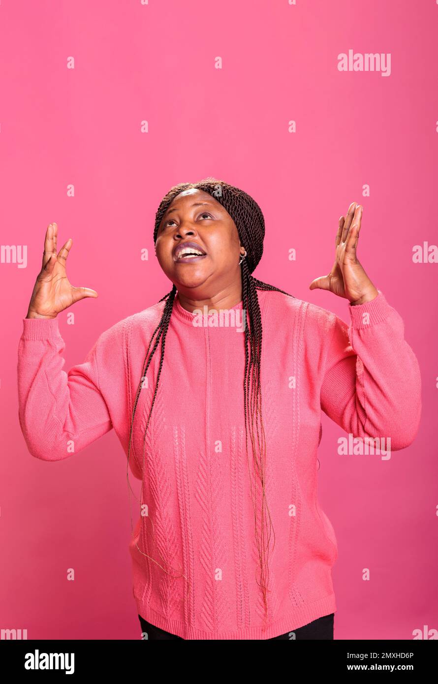 Portrait of angry young adult feeling frustrated and mad while doing ...