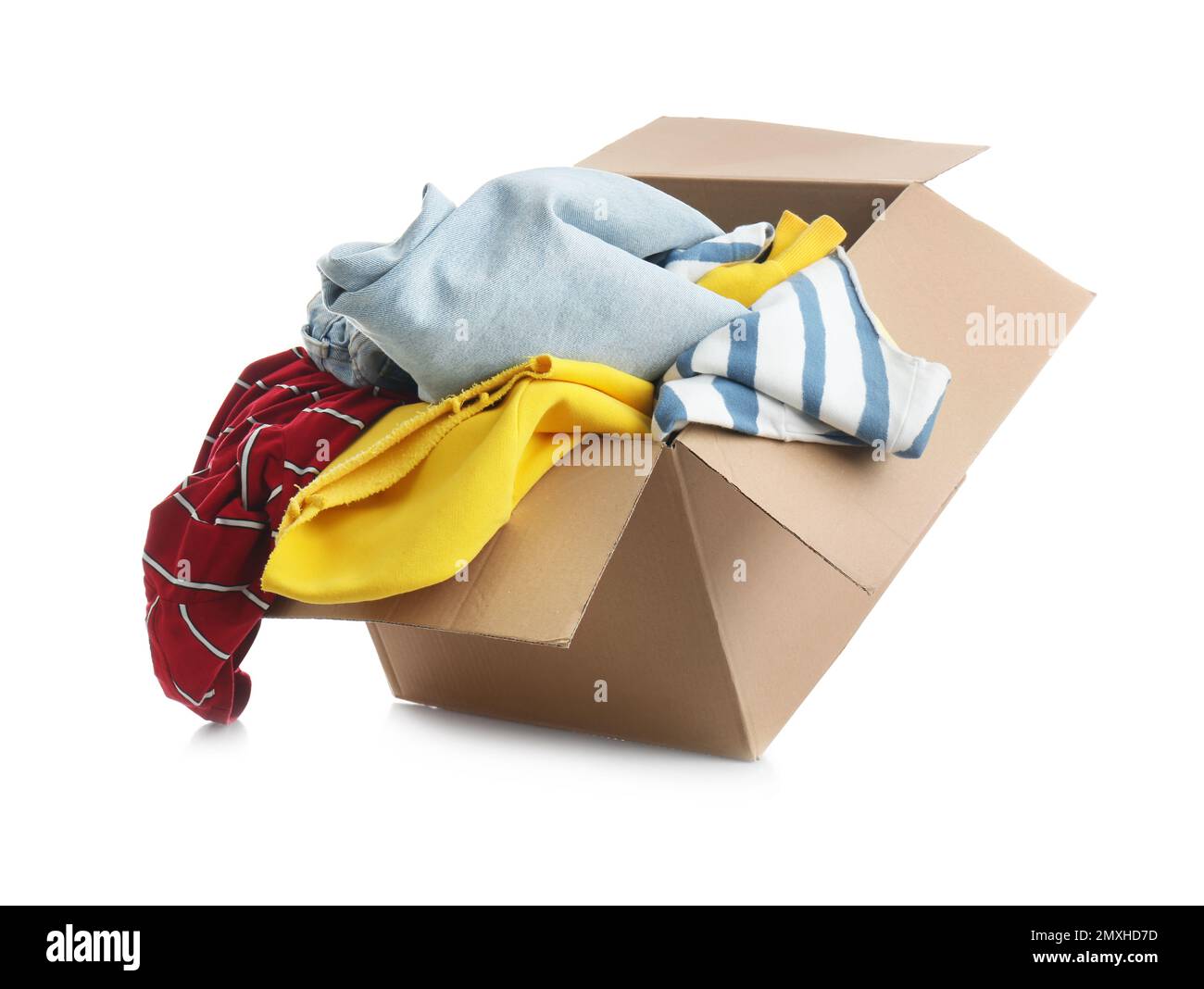 Cardboard box with clothes isolated on white Stock Photo - Alamy