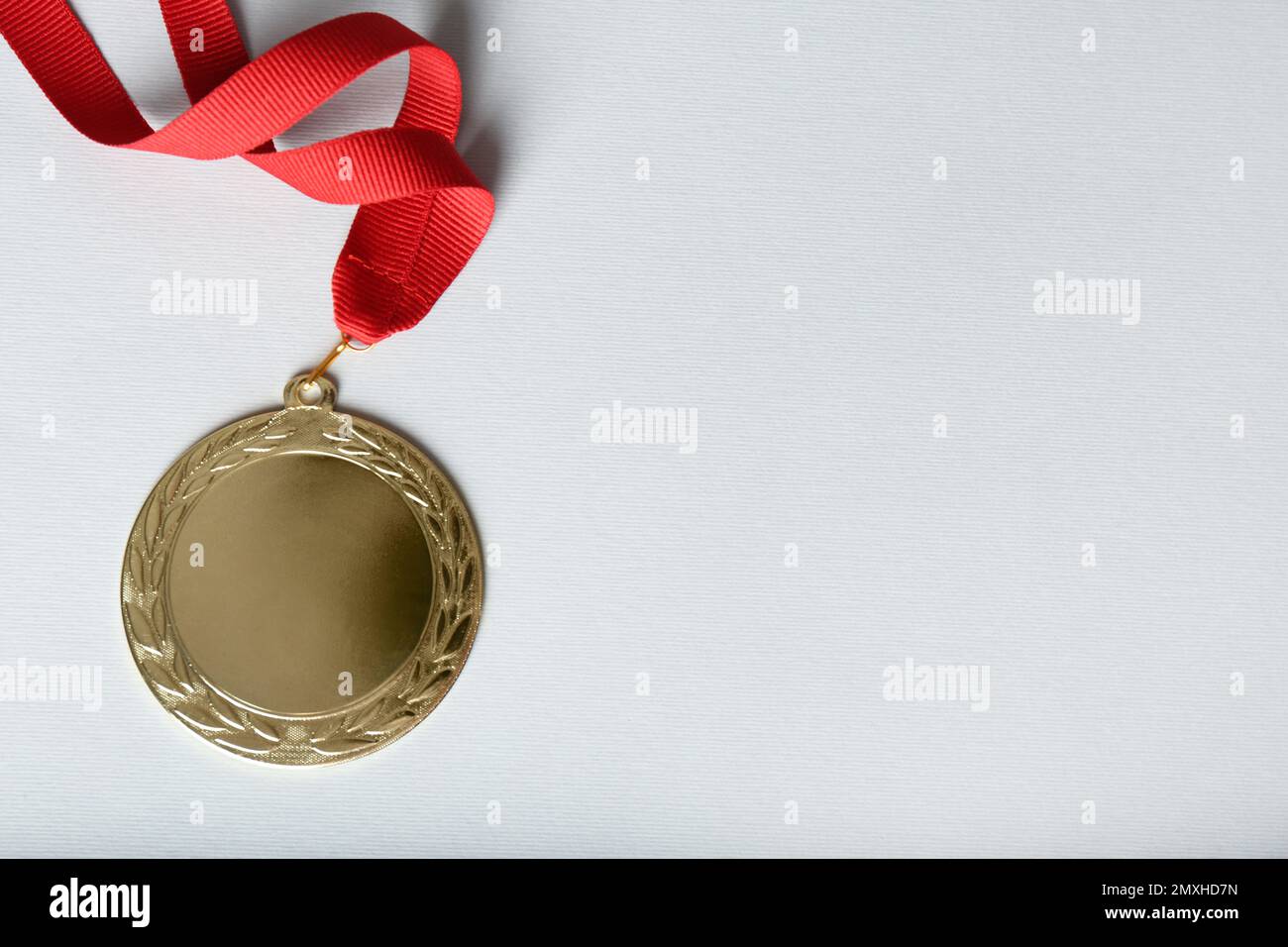 Gold medal on white background, top view. Space for design Stock Photo ...