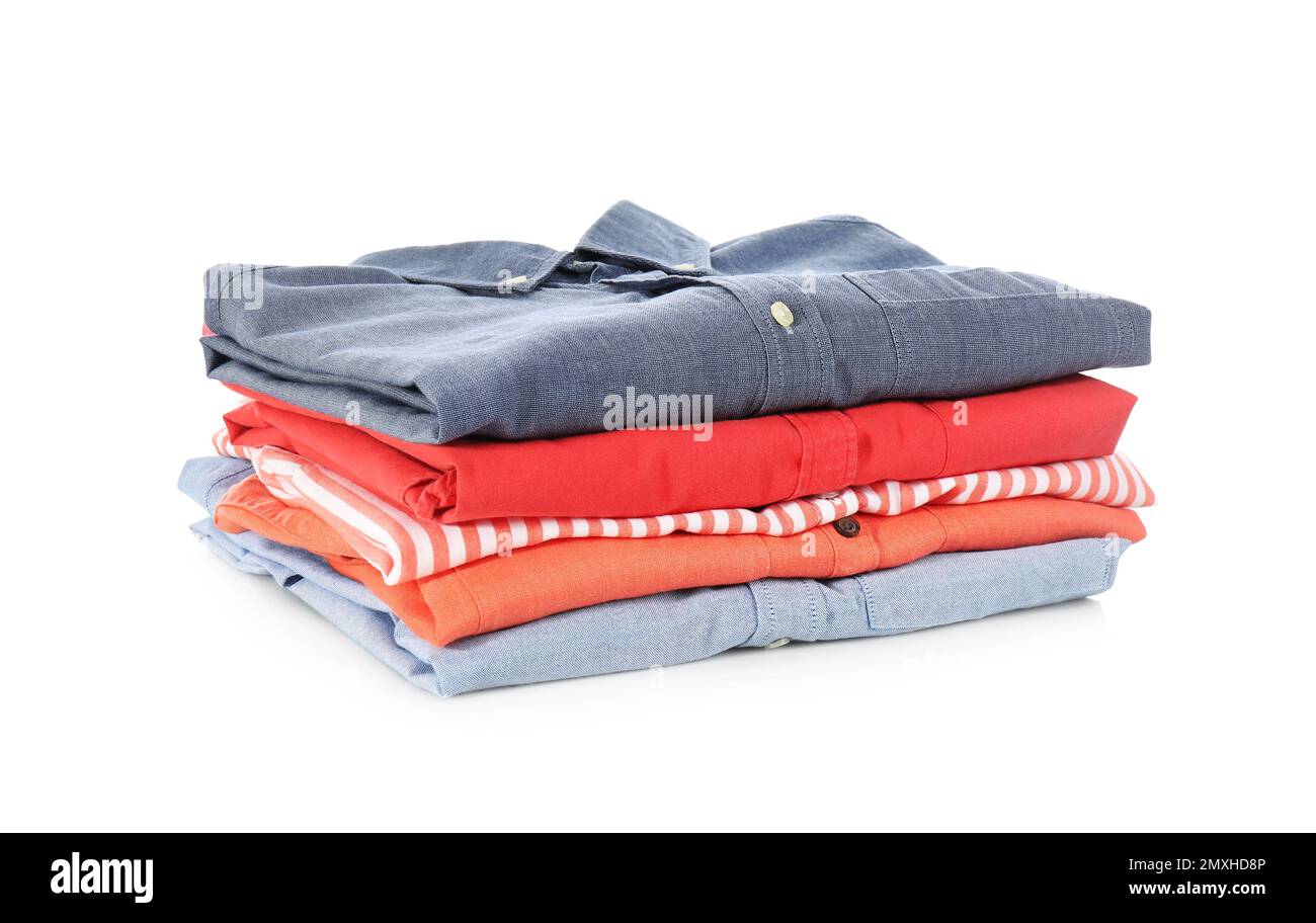 Stack of folded clothes isolated on white Stock Photo - Alamy