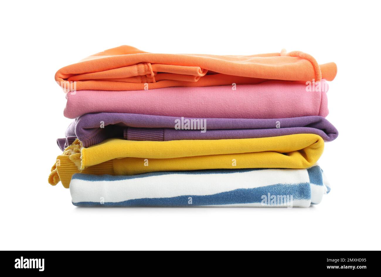 Stack of folded clothes isolated on white Stock Photo - Alamy
