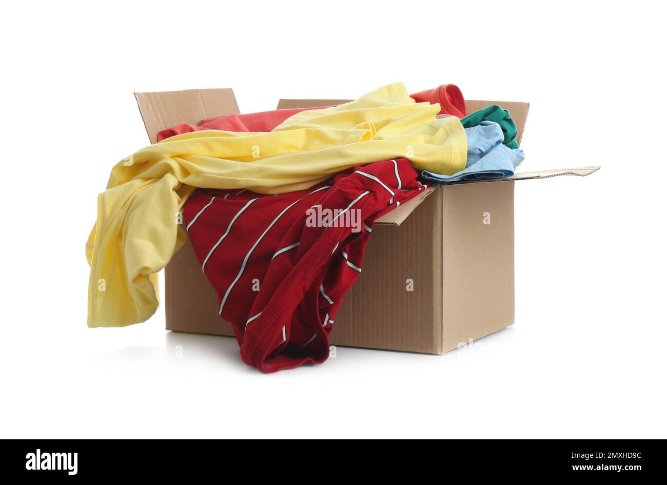 Cardboard box with clothes isolated on white Stock Photo - Alamy