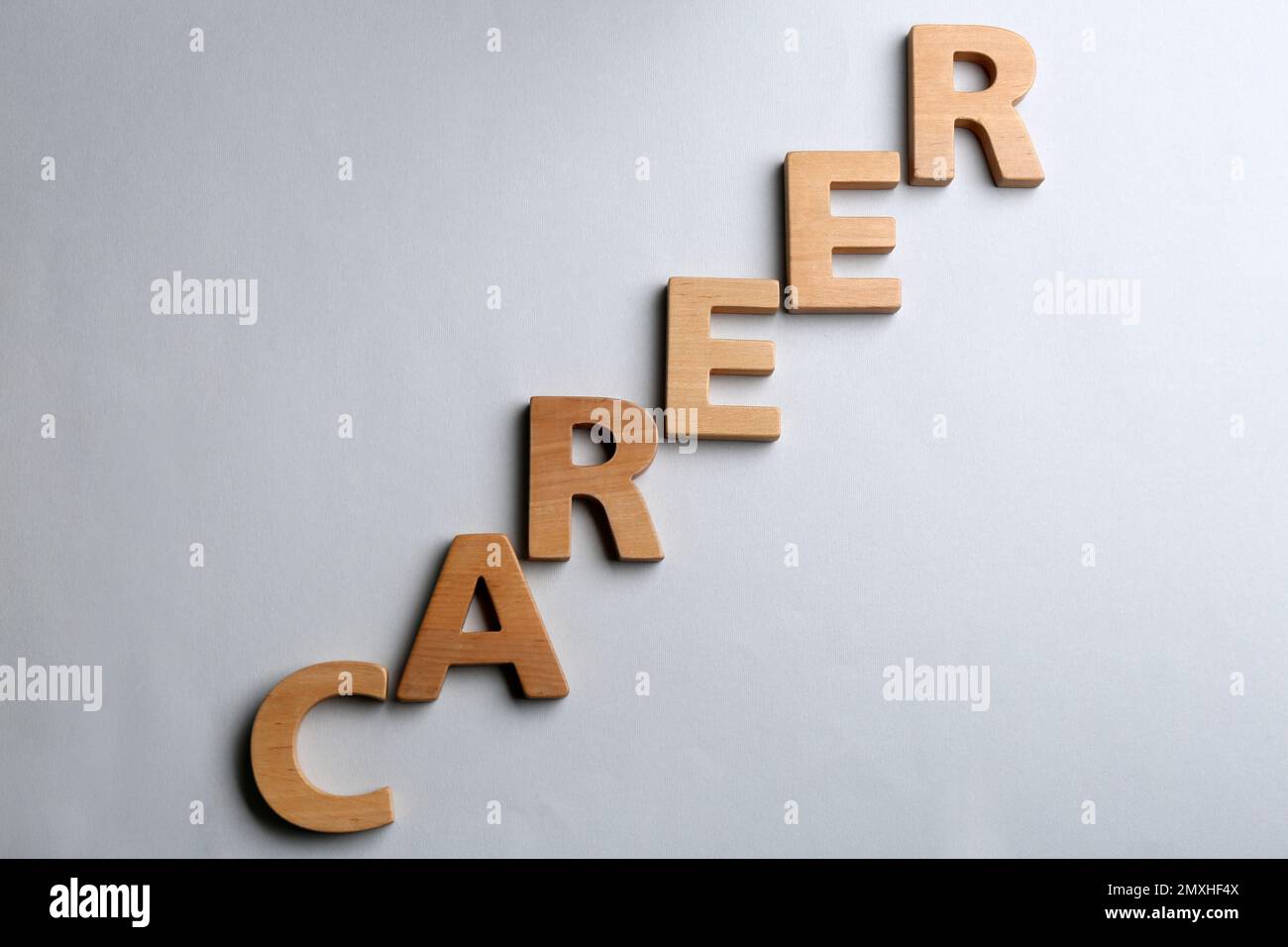 Word CAREER made of wooden letters on grey background, flat lay ...