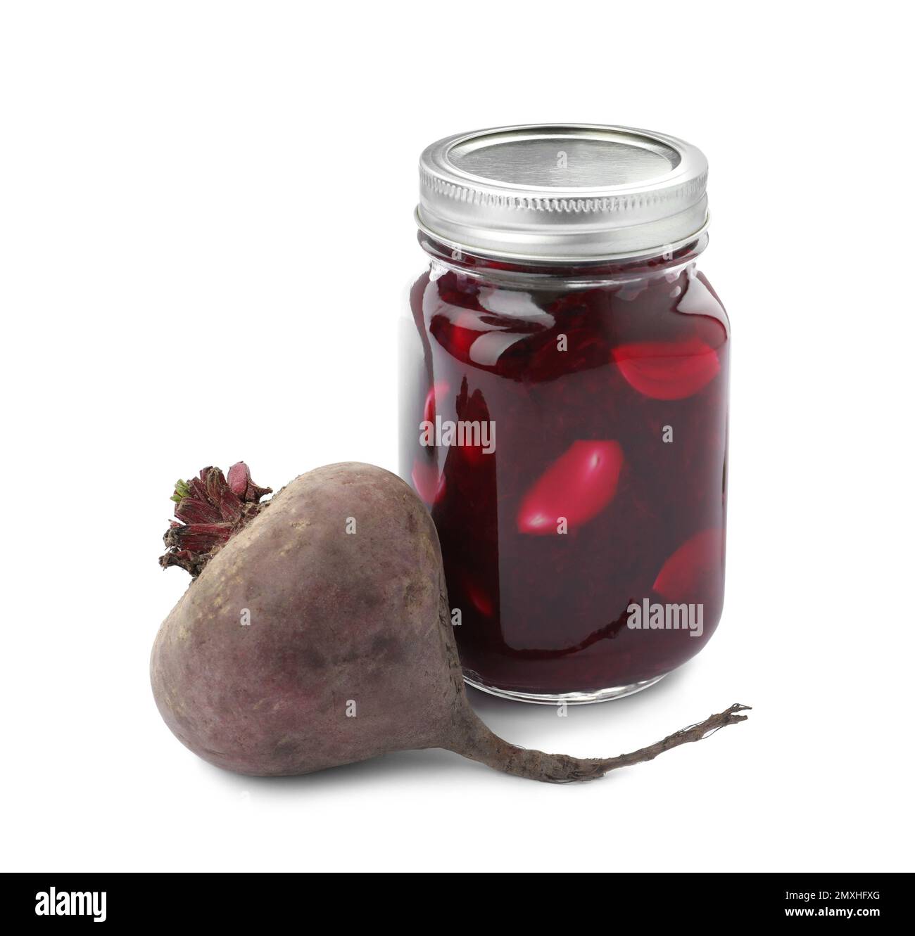 Pickled beets in glass jar and fresh vegetable isolated on white Stock ...
