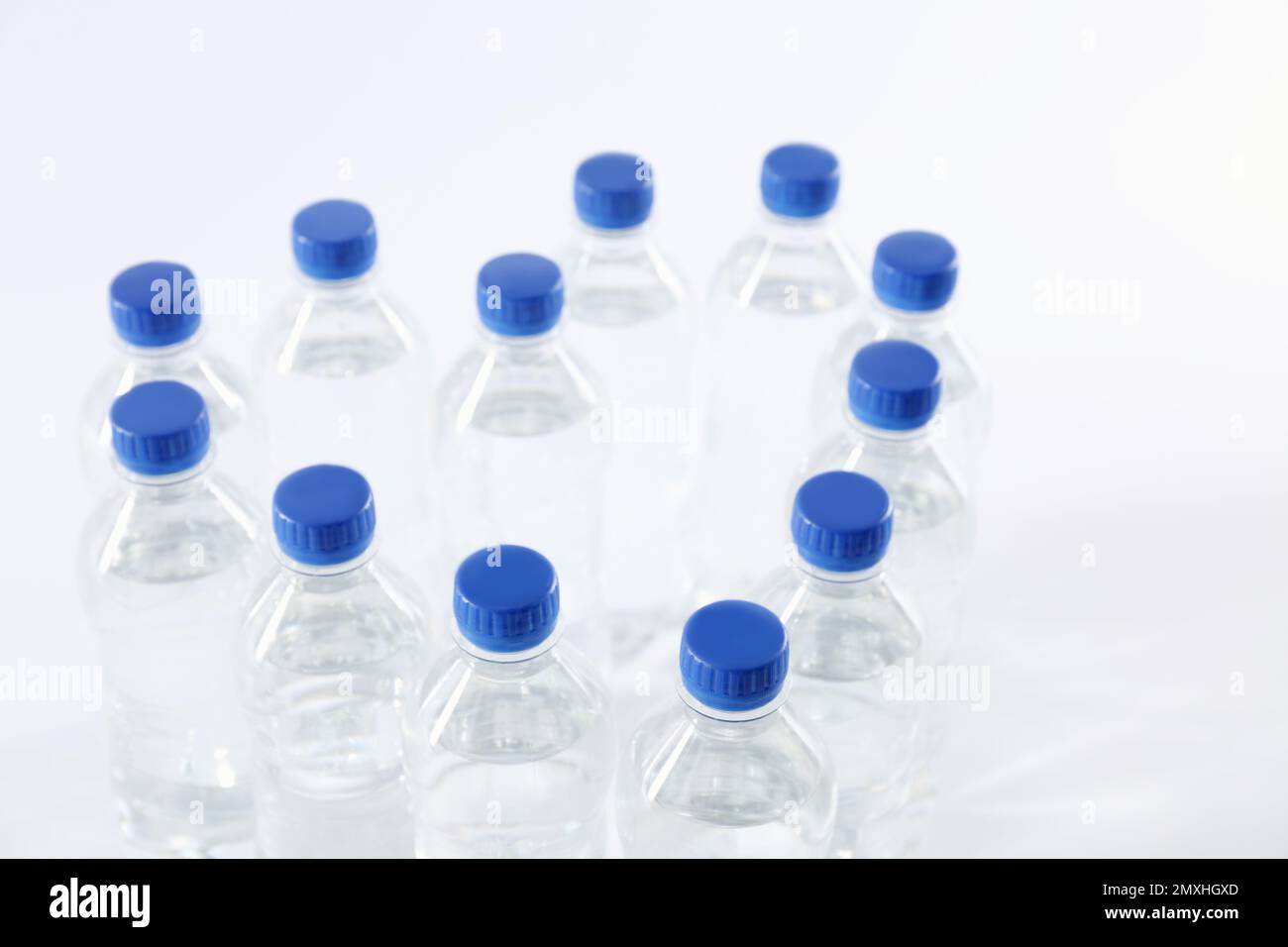 Heart made with plastic bottles of pure water on white background Stock ...