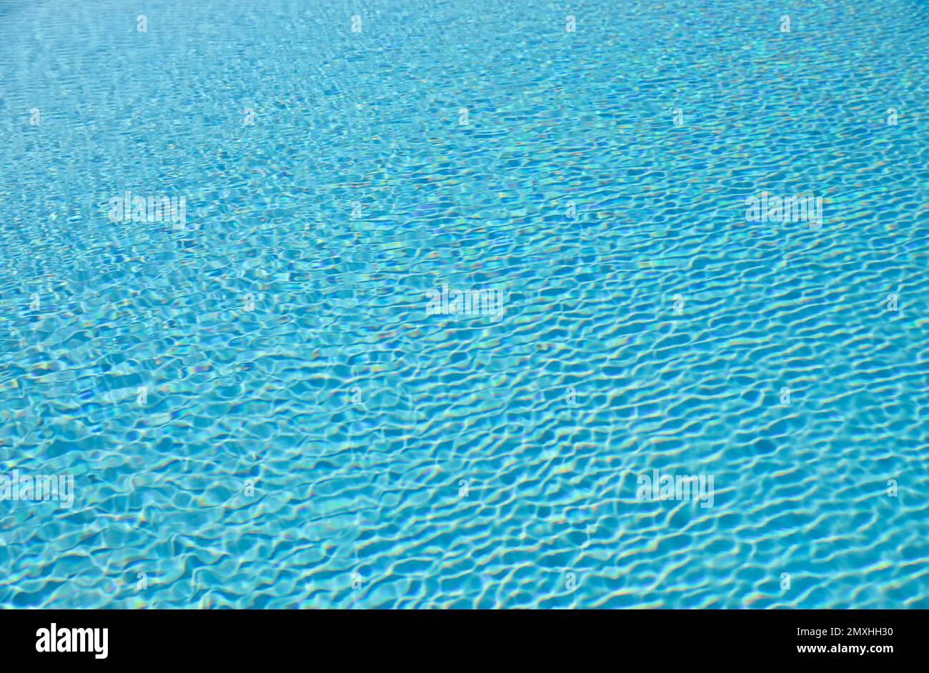 Swimming pool with clean blue water as background. Summer vacation ...
