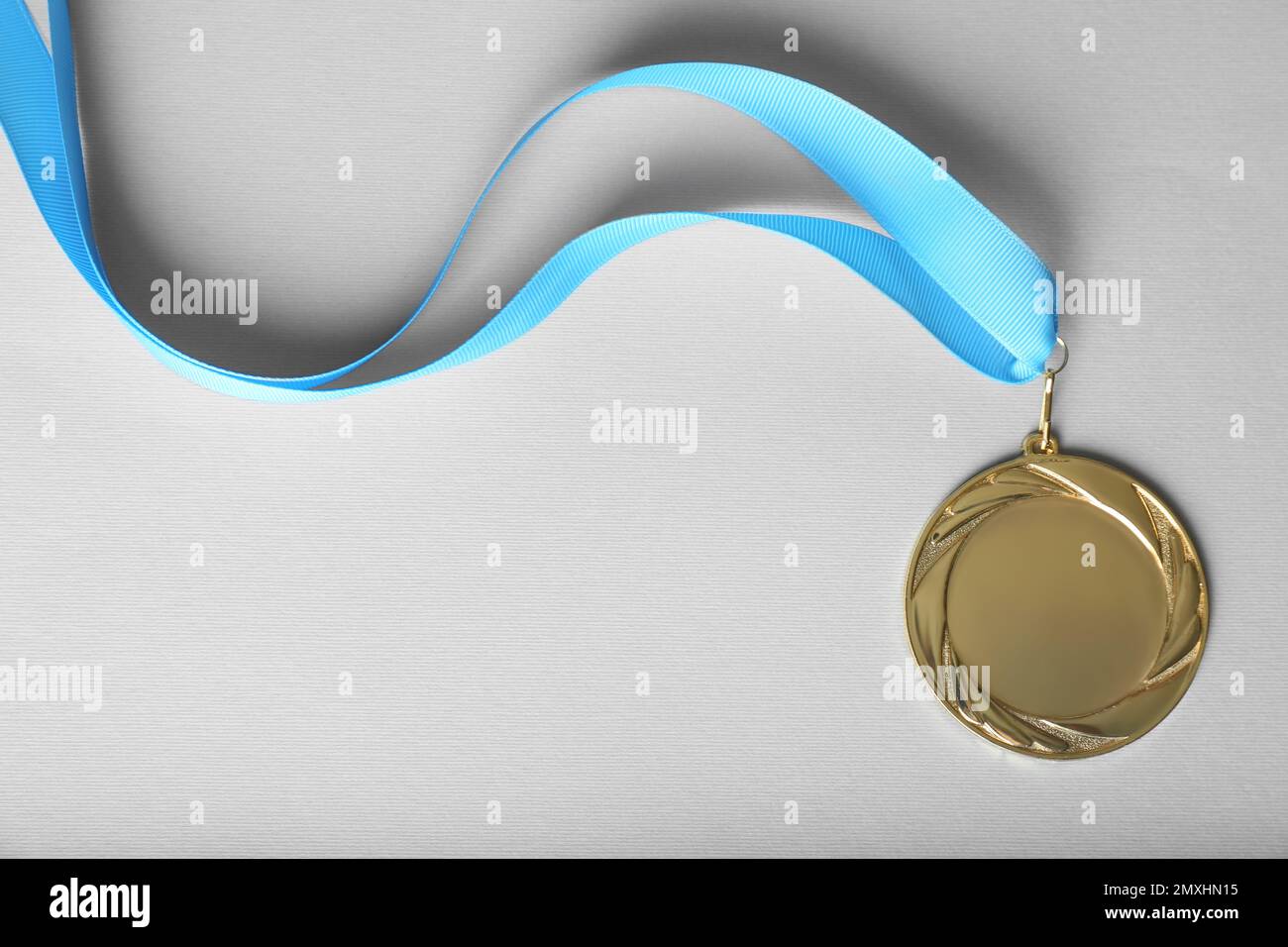 Gold medal on white background, top view. Space for design Stock Photo ...
