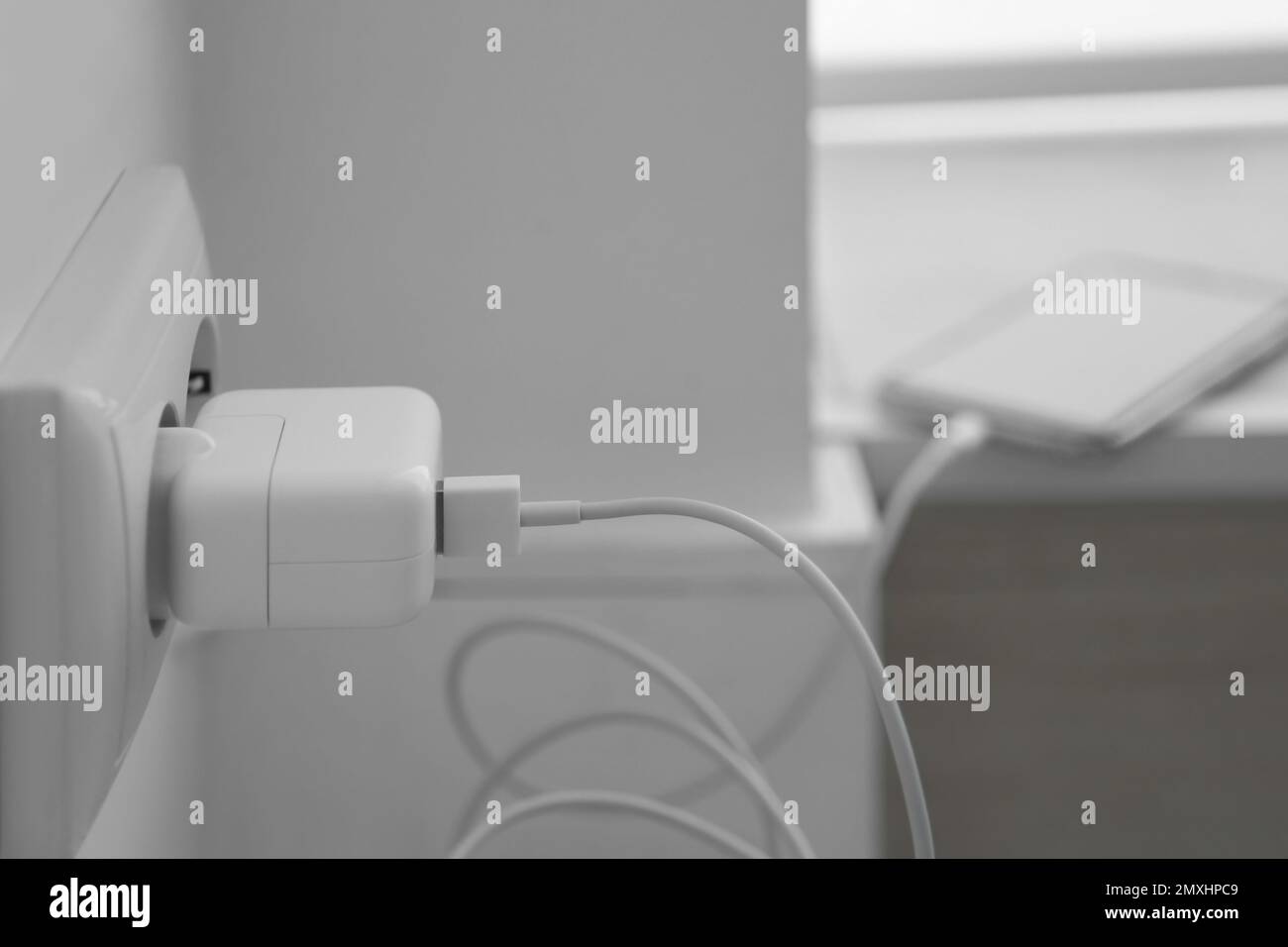 Modern smartphone charging from electric socket, closeup Stock Photo ...