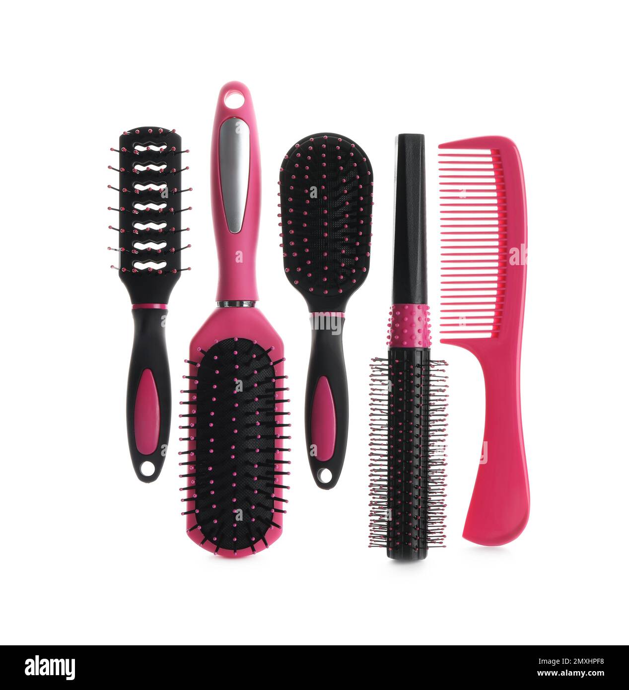 Set of professional hair brushes and comb isolated on white, top view ...
