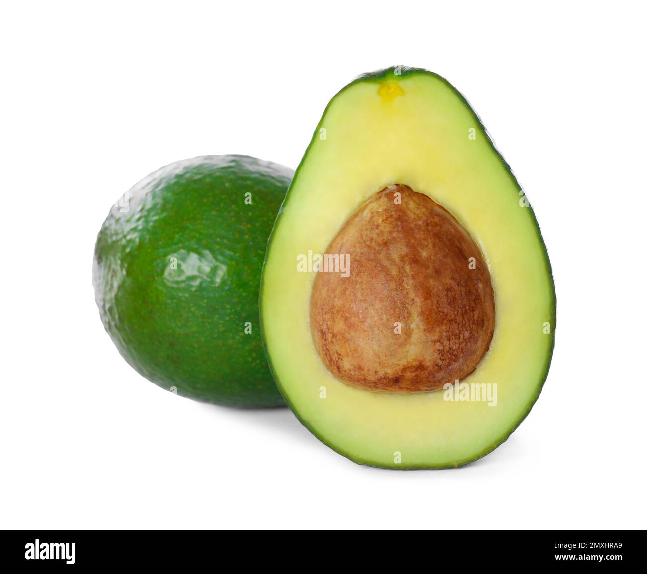 Whole and cut avocados isolated on white Stock Photo - Alamy