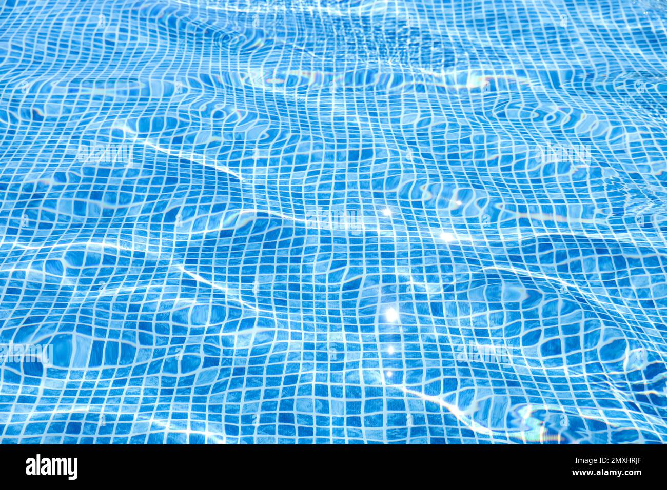 Swimming pool with clean blue water as background. Summer vacation ...