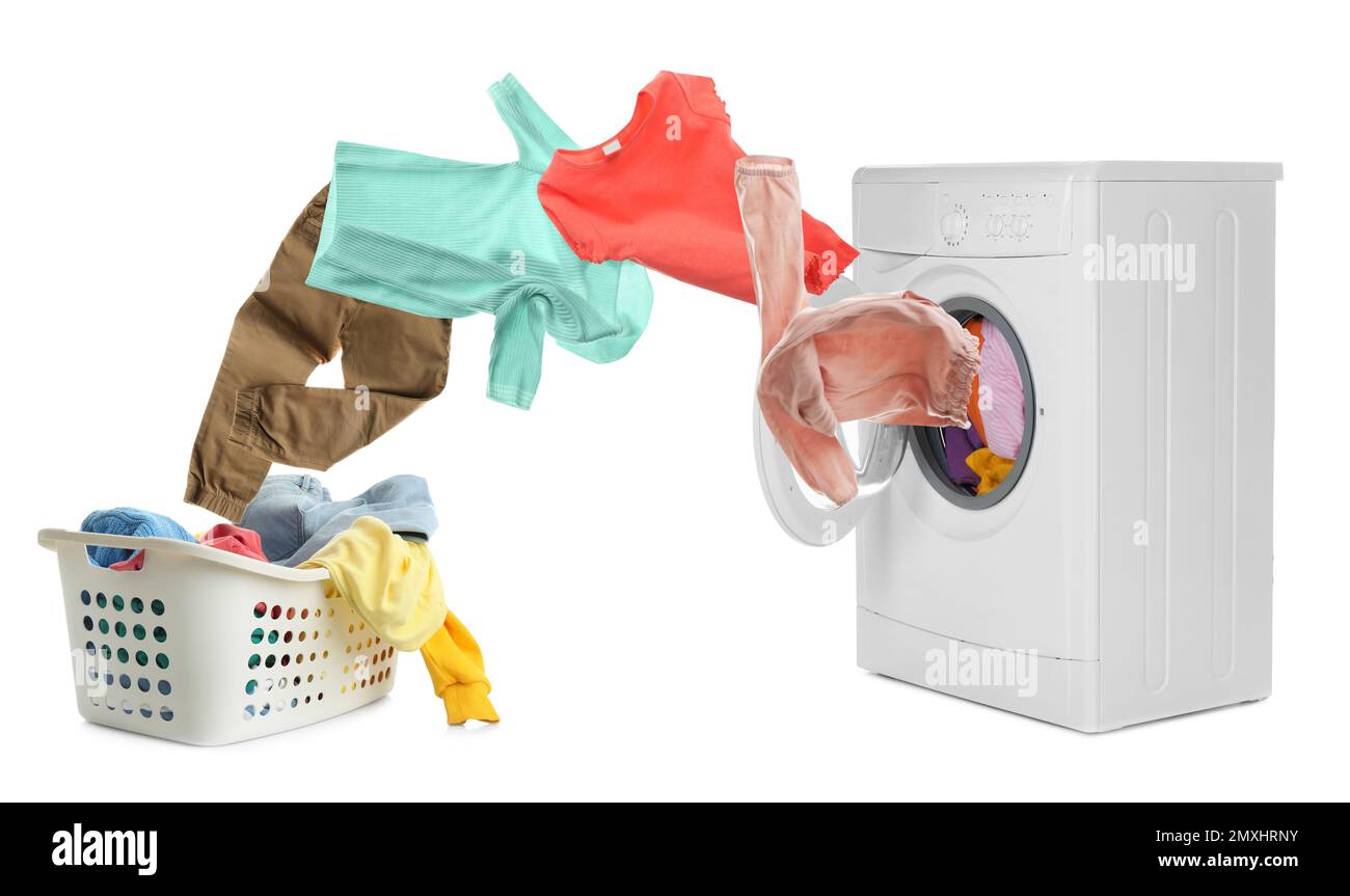 Washing machine and flying clothes on white background Stock Photo - Alamy