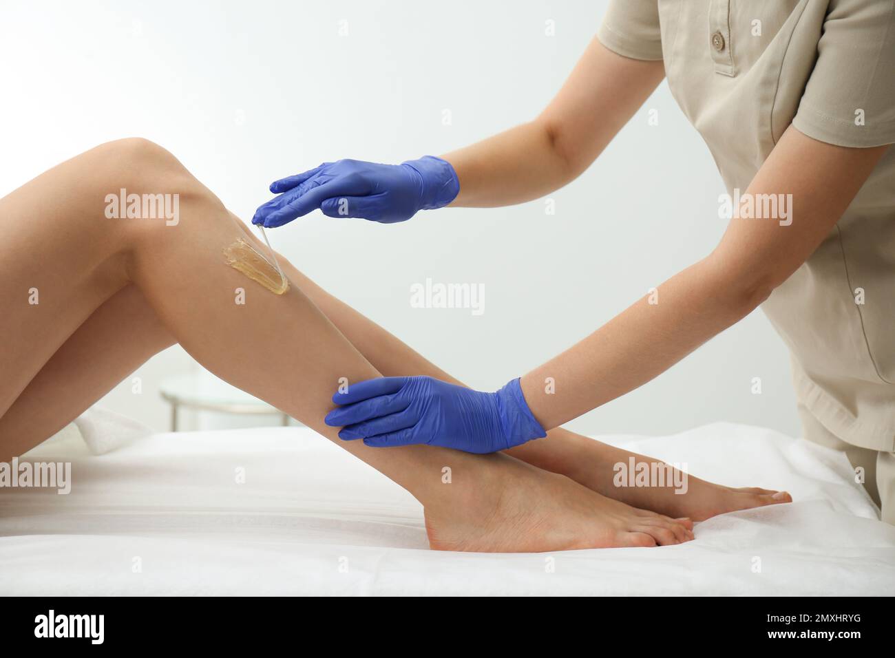 Epilation of legs hi-res stock photography and images - Alamy