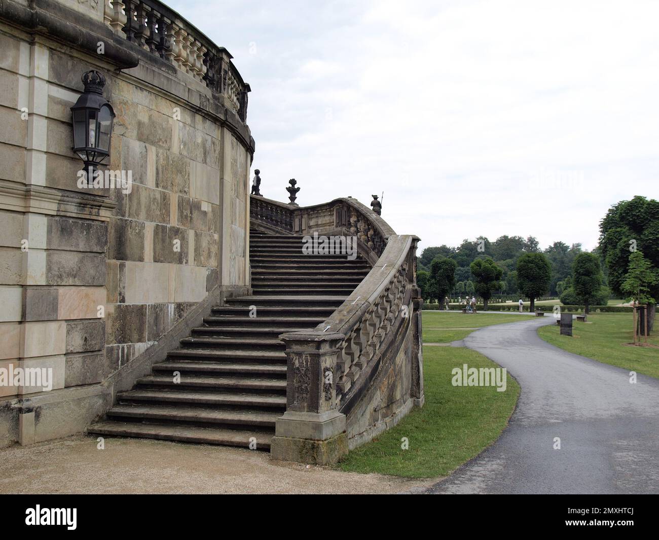 The famous staircase of Moritzburg Castle with a pathway leading to the ...