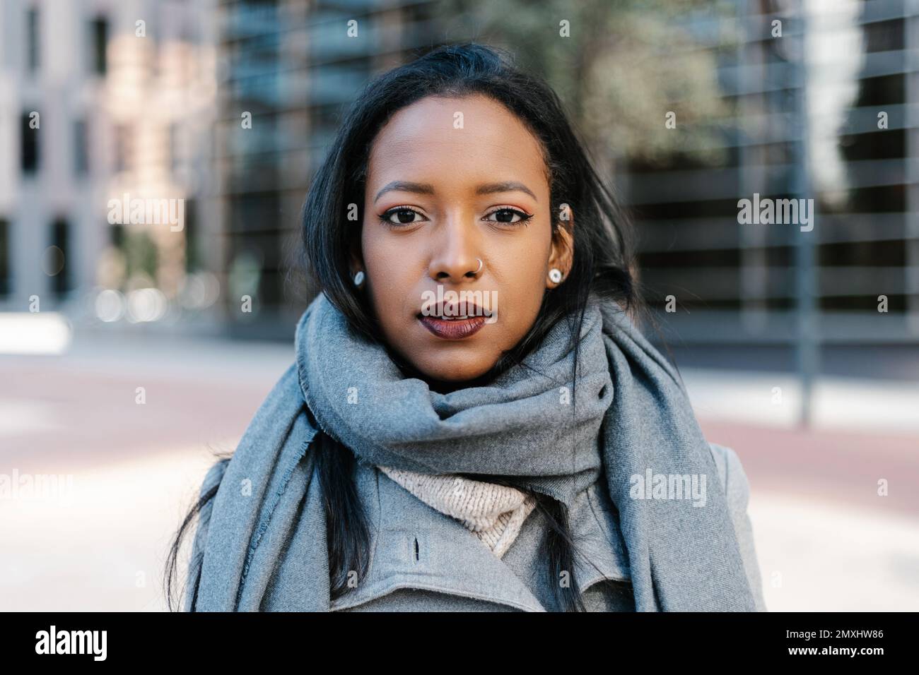 Portrait of successful young latin american business woman standing ... Portrait of successful young latin american business woman standing ...