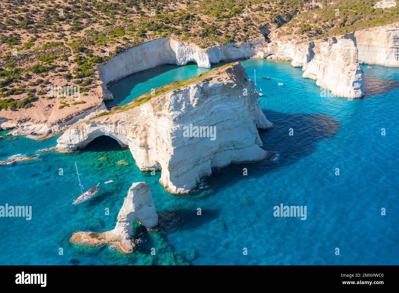 Kleftiko Bay, a scenic attraction with white volcanic rocks and caves ...