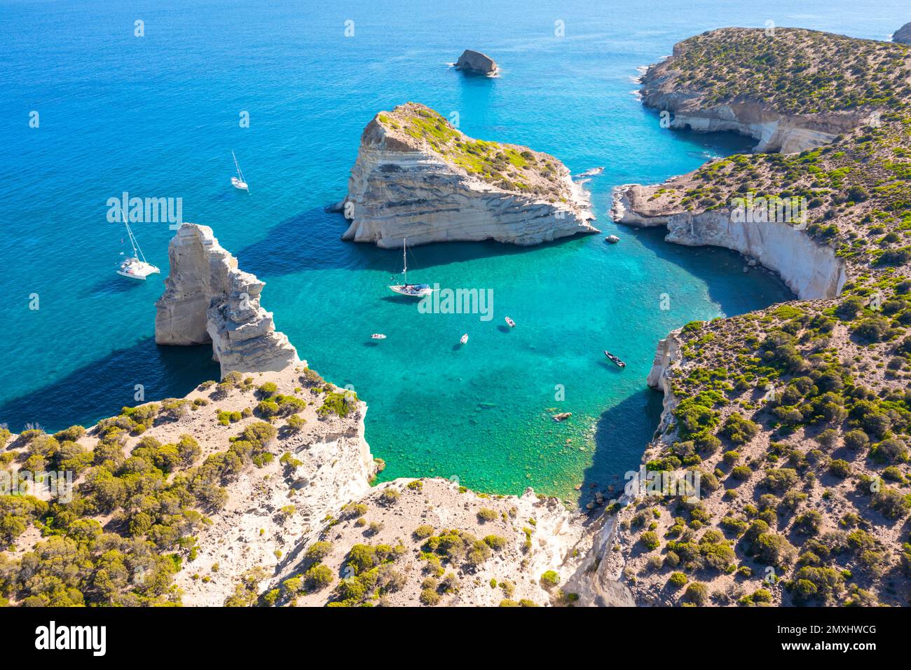Kleftiko Bay, a scenic attraction with white volcanic rocks and caves ...