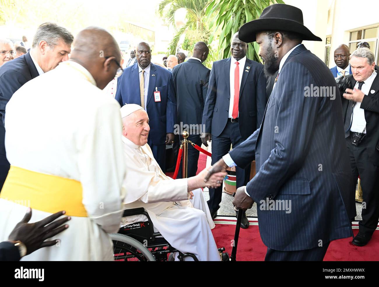 President of South Sudan Salva Kiir (R) walks next to Pope Francis (L) upon the Pope's arrival ...